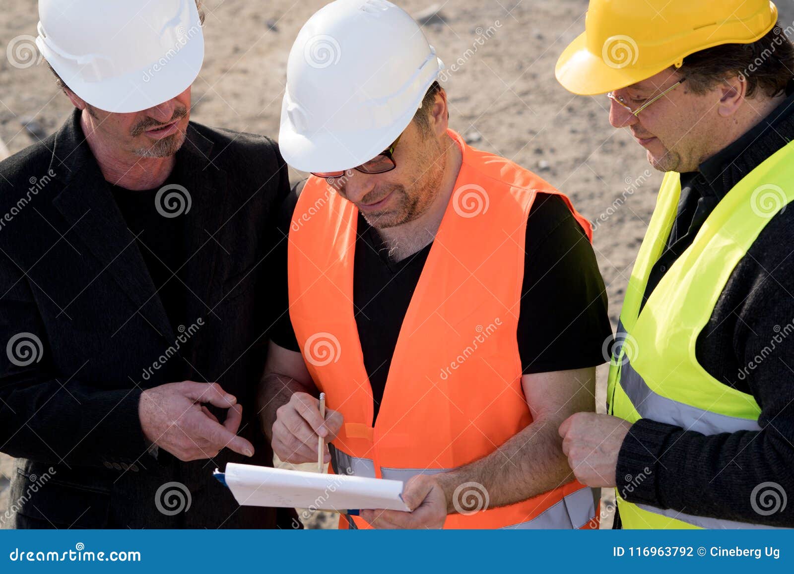 Civil Engineers Writing on a Notebook Stock Photo - Image of clothing ...