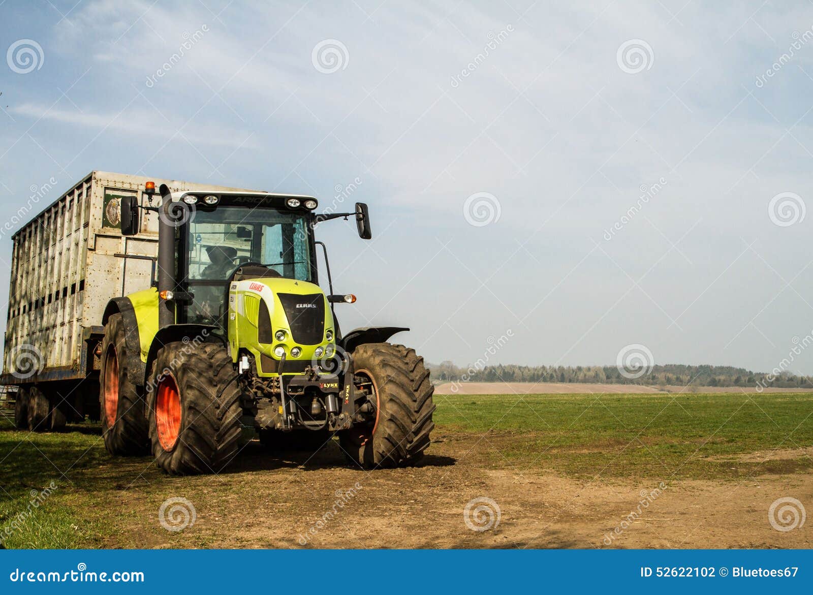 Green Claas Tractor and Cattle Sheep Trailer Editorial Photography ...