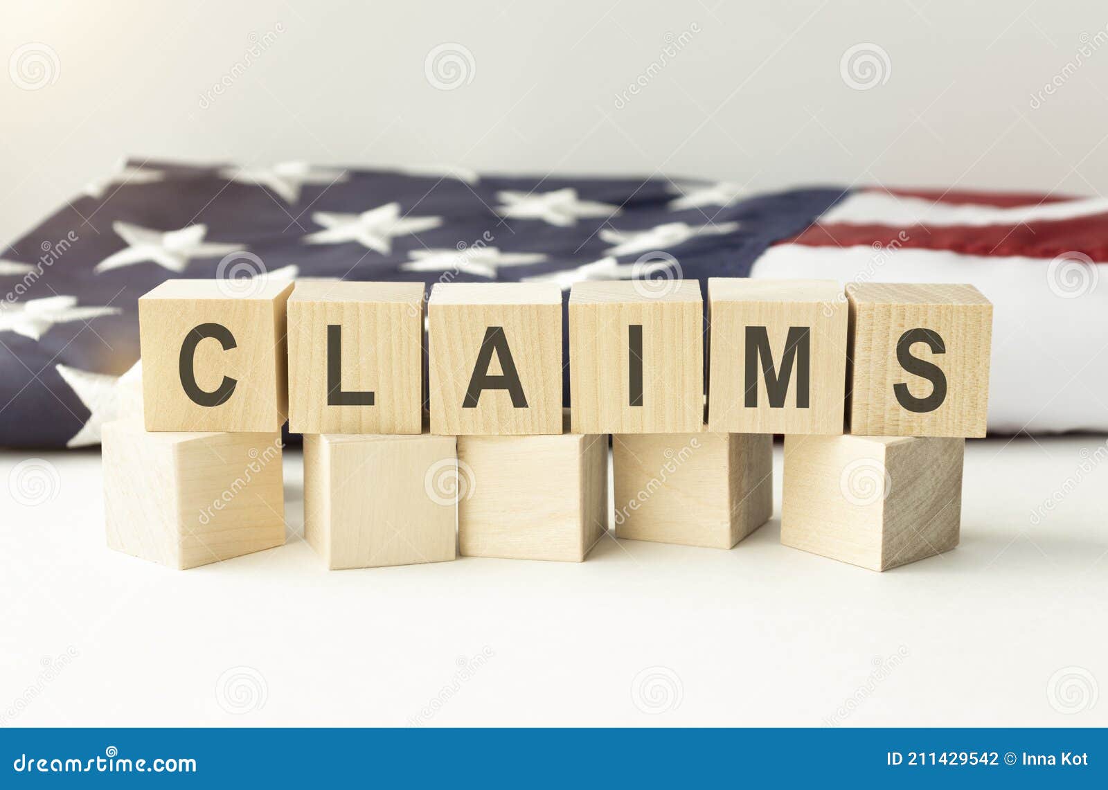 CLAIMS Word Written On Wooden Blocks On Light Blue Background Stock ...