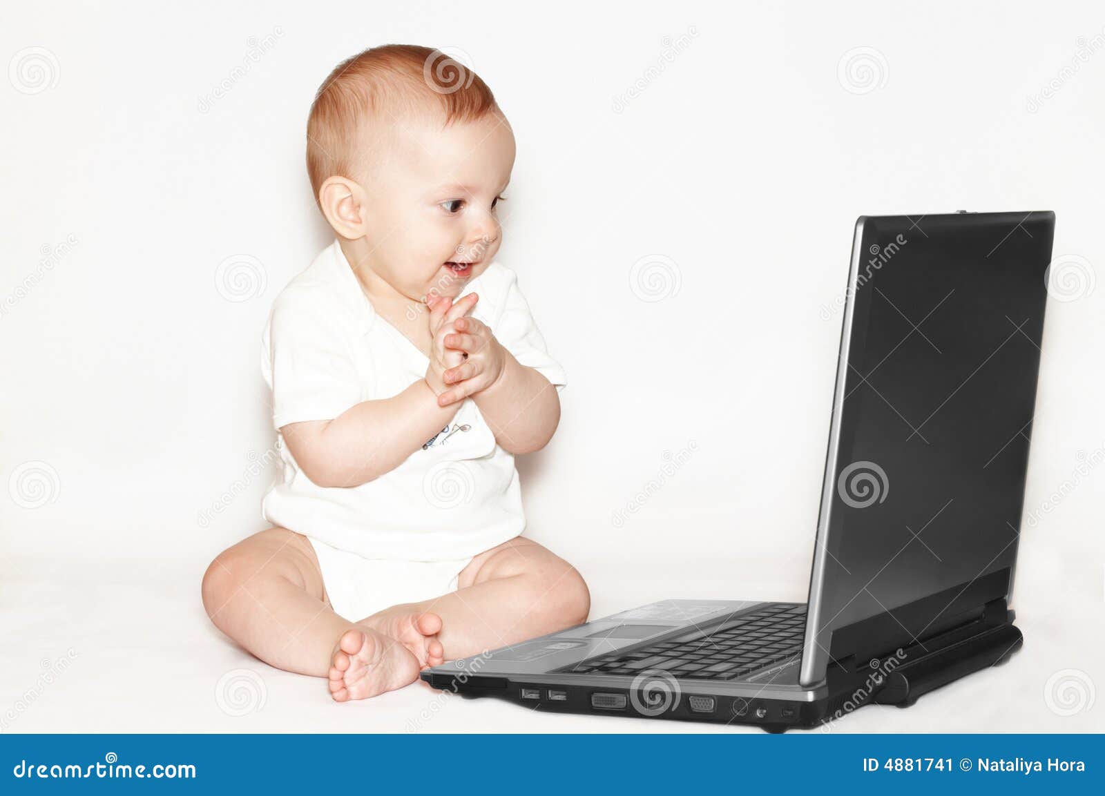 Clapped baby with notebook stock image. Image of adorable - 4881741