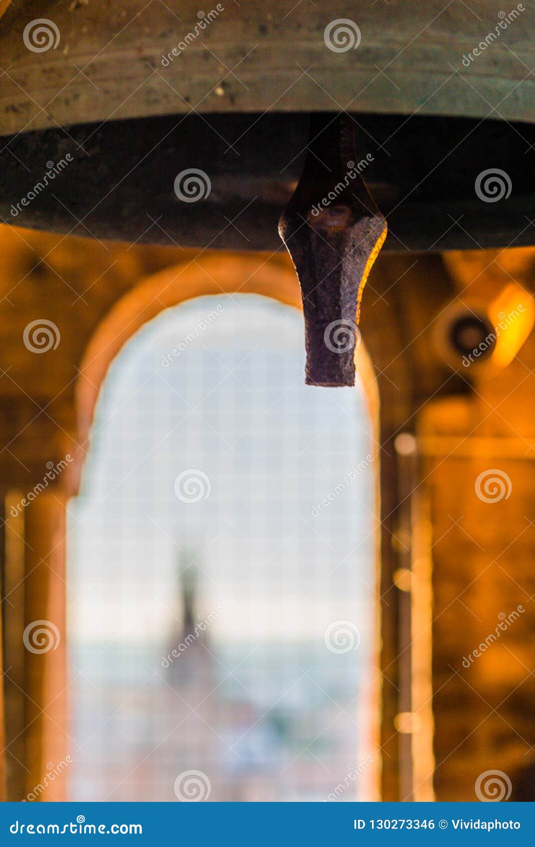 Clapper of ancient bell stock photo. Image of tower - 130273346