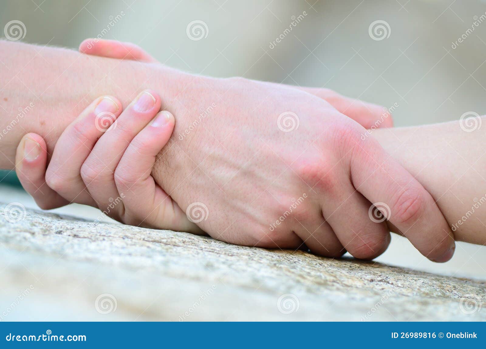Clasped hand for help stock photo. Image of holding, extreme - 26989816