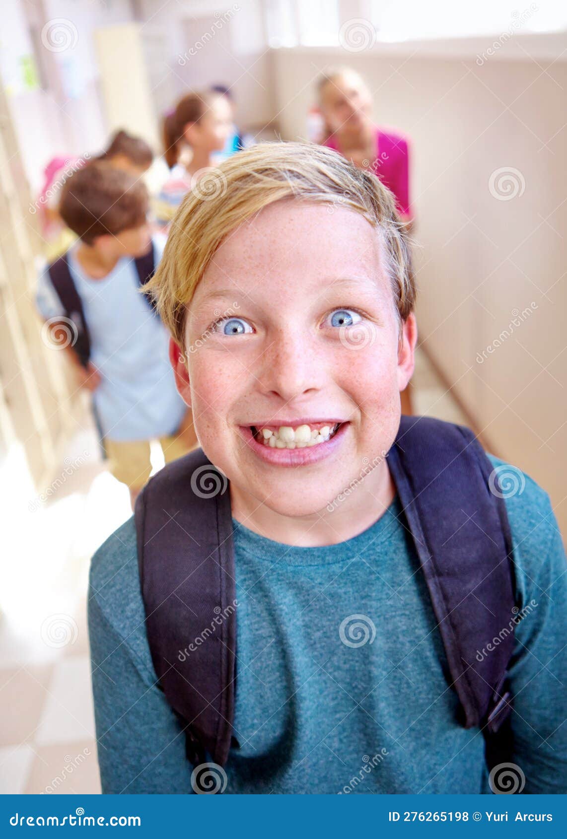 Class Clown. Closeup Portrait of a Young Schoolboy Pulling a Face ...