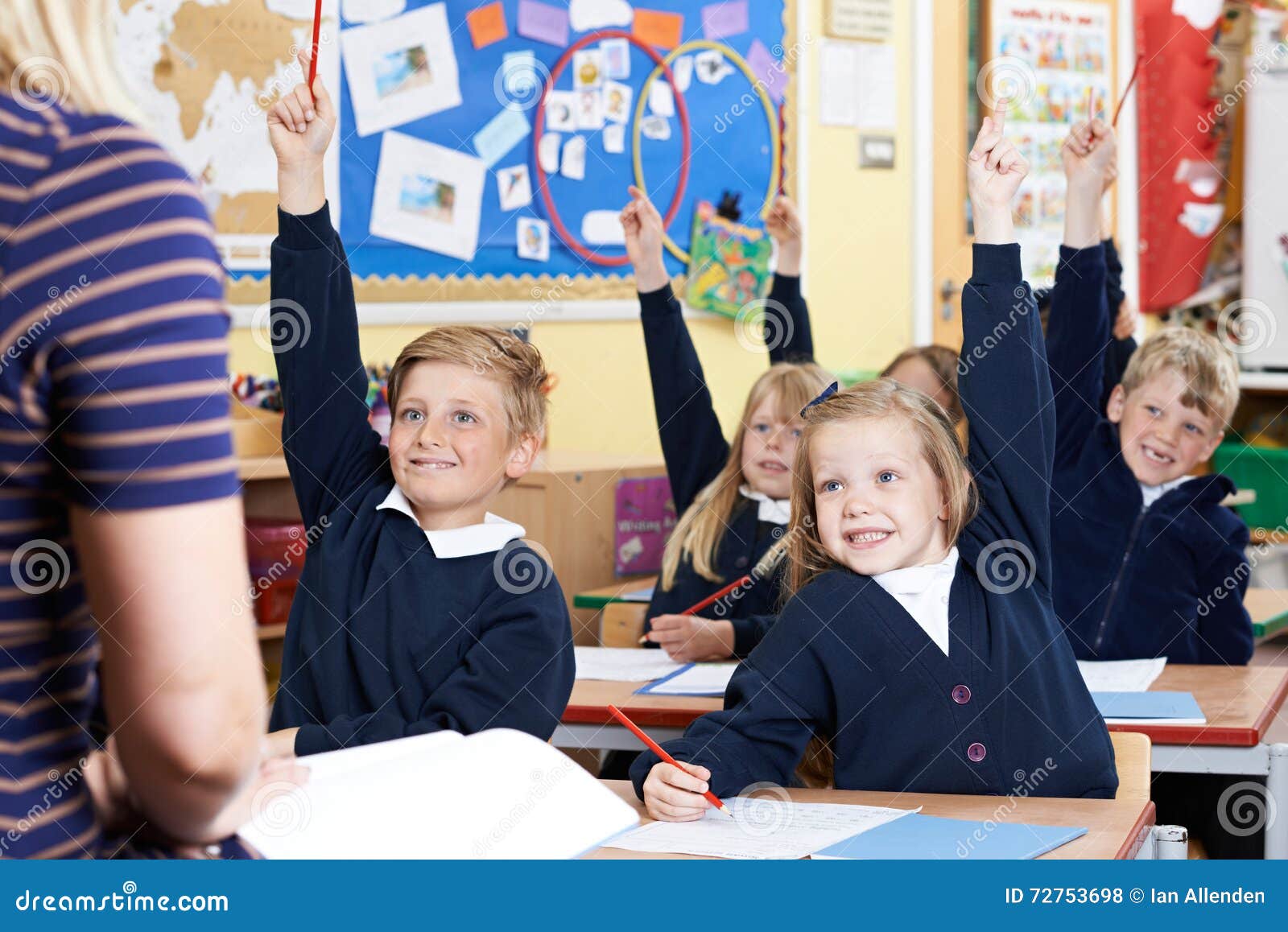 Class of Elementary School Pupils Answering Question Stock Photo ...