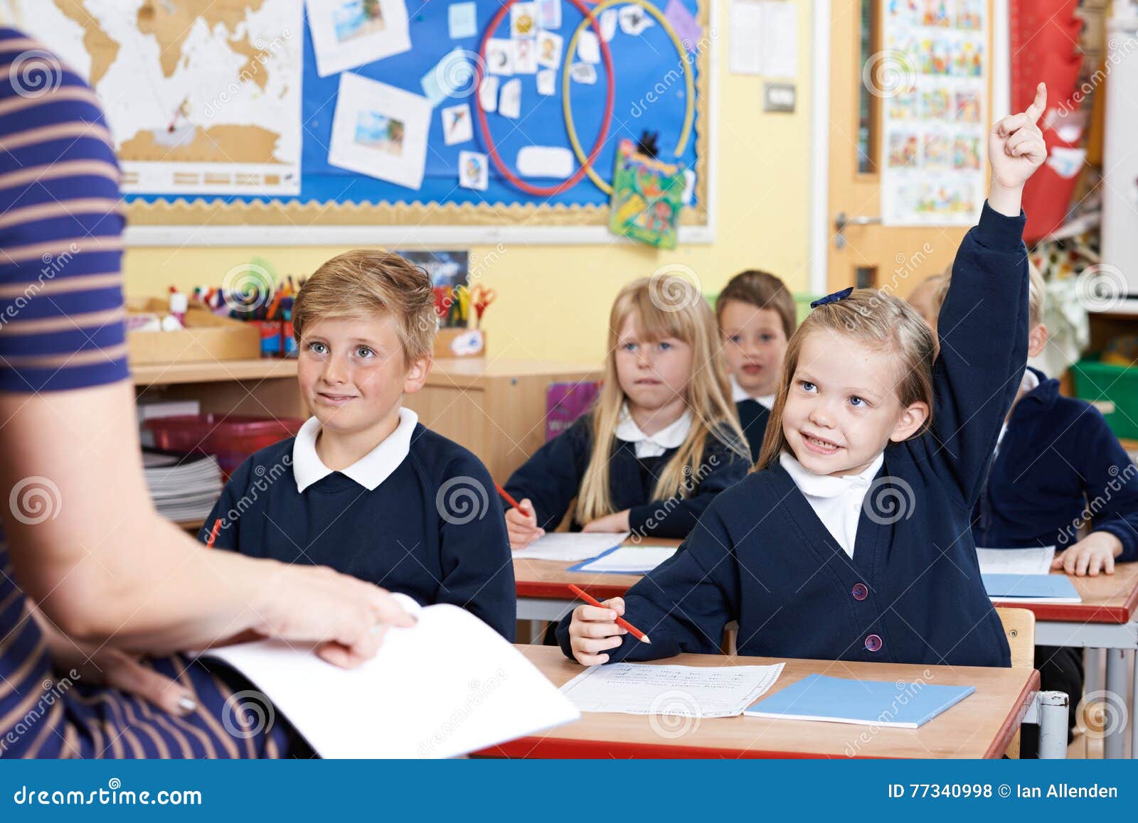 Class of Elementary School Pupils Answering Question Stock Photo ...