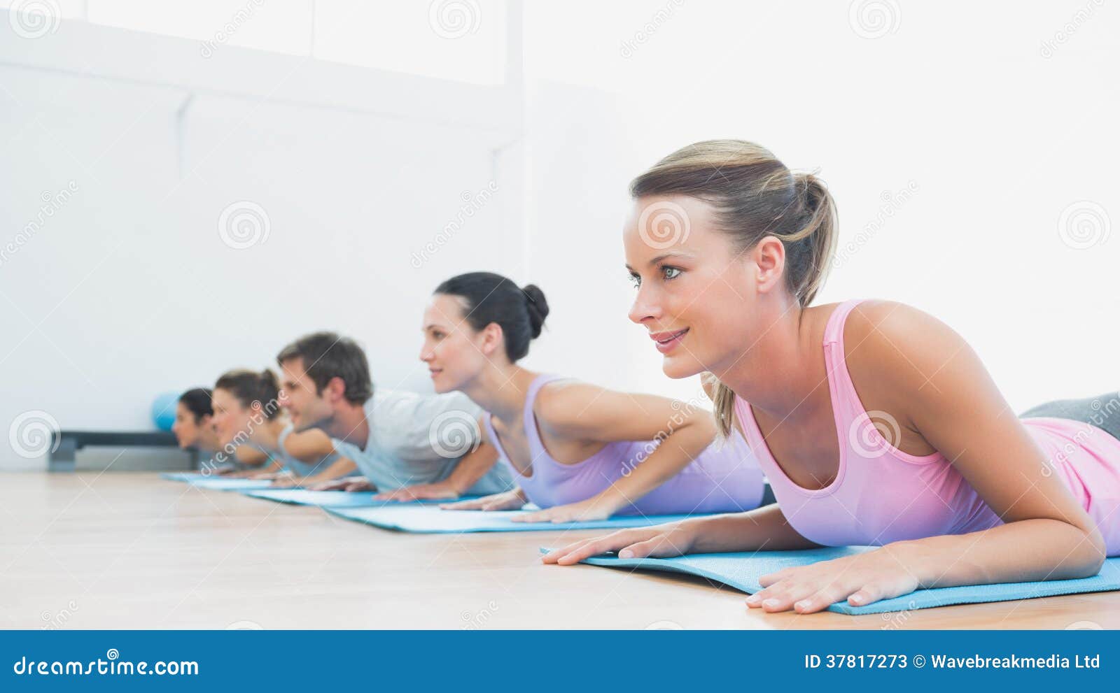 Class Exercising in Row at Fitness Studio Stock Image - Image of ...