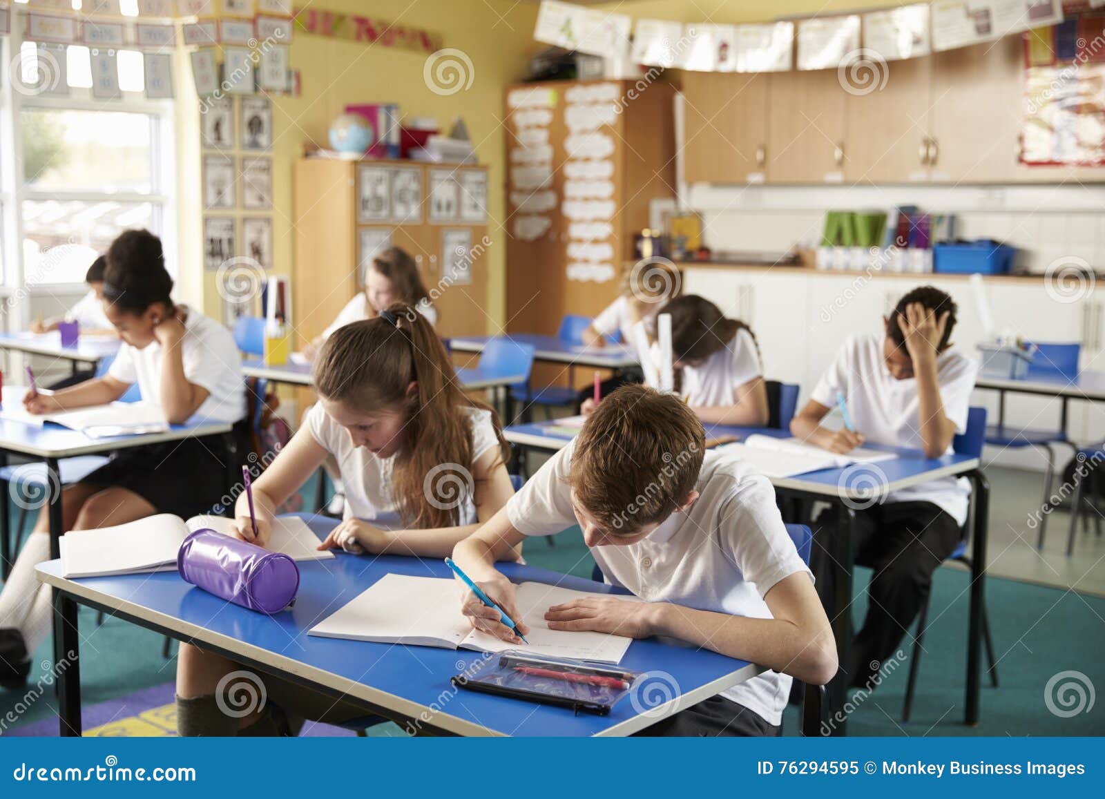 Class of Primary School Kids Studying in a Classroom Stock Image ...
