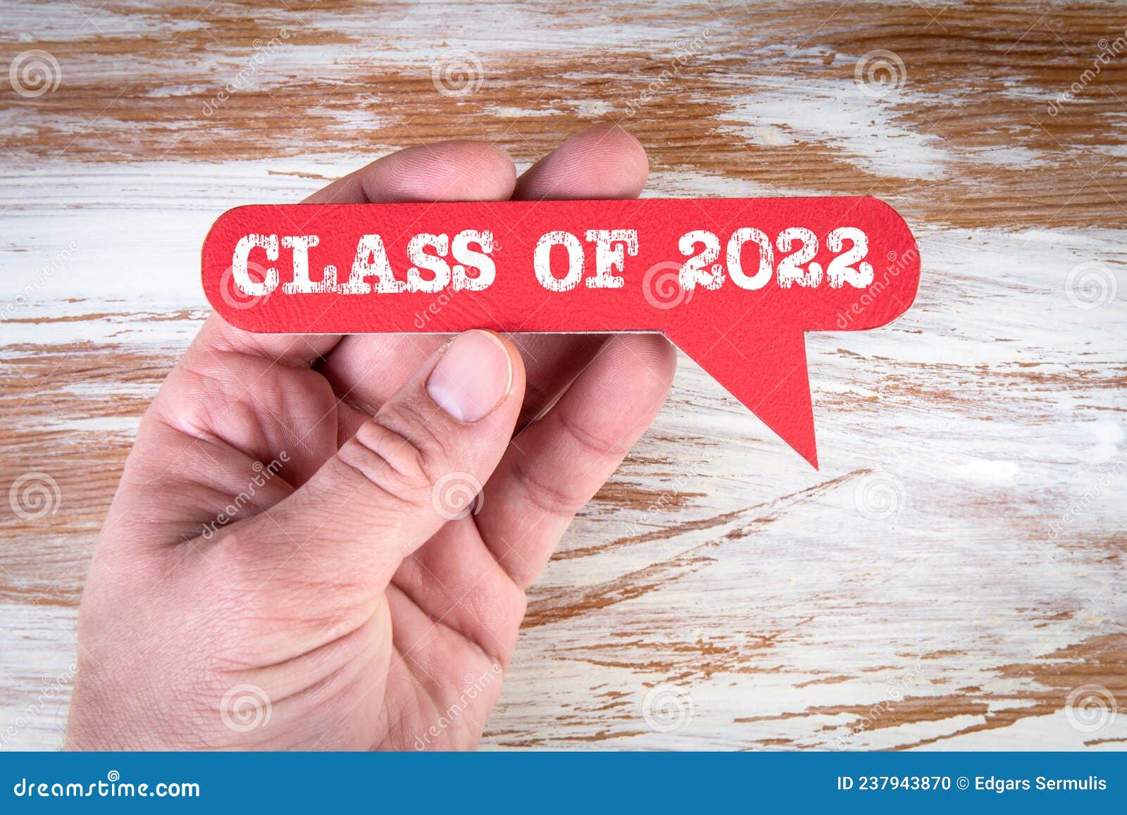 Class of 2022. Red Speech Bubble with Text on a White Wooden Background ...