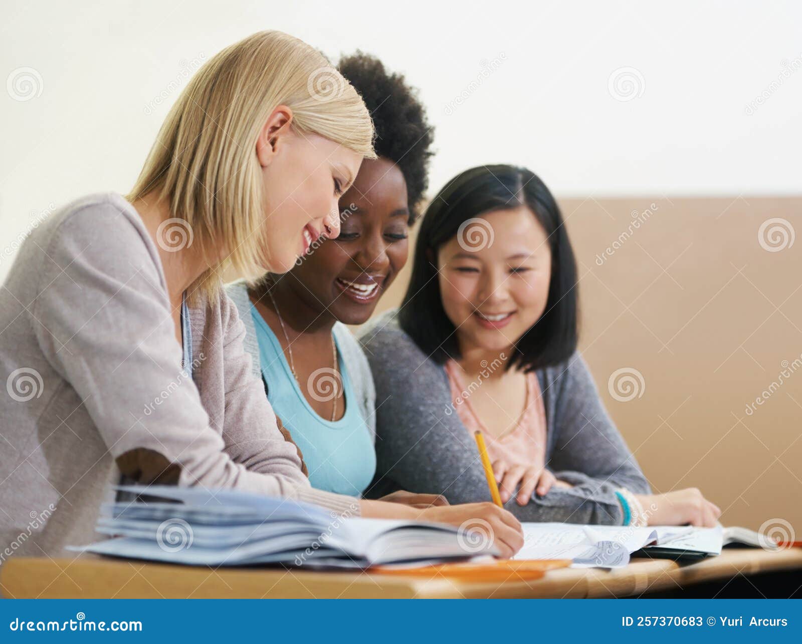 Class is in Session. Female University Students Sitting in an Exam Room ...