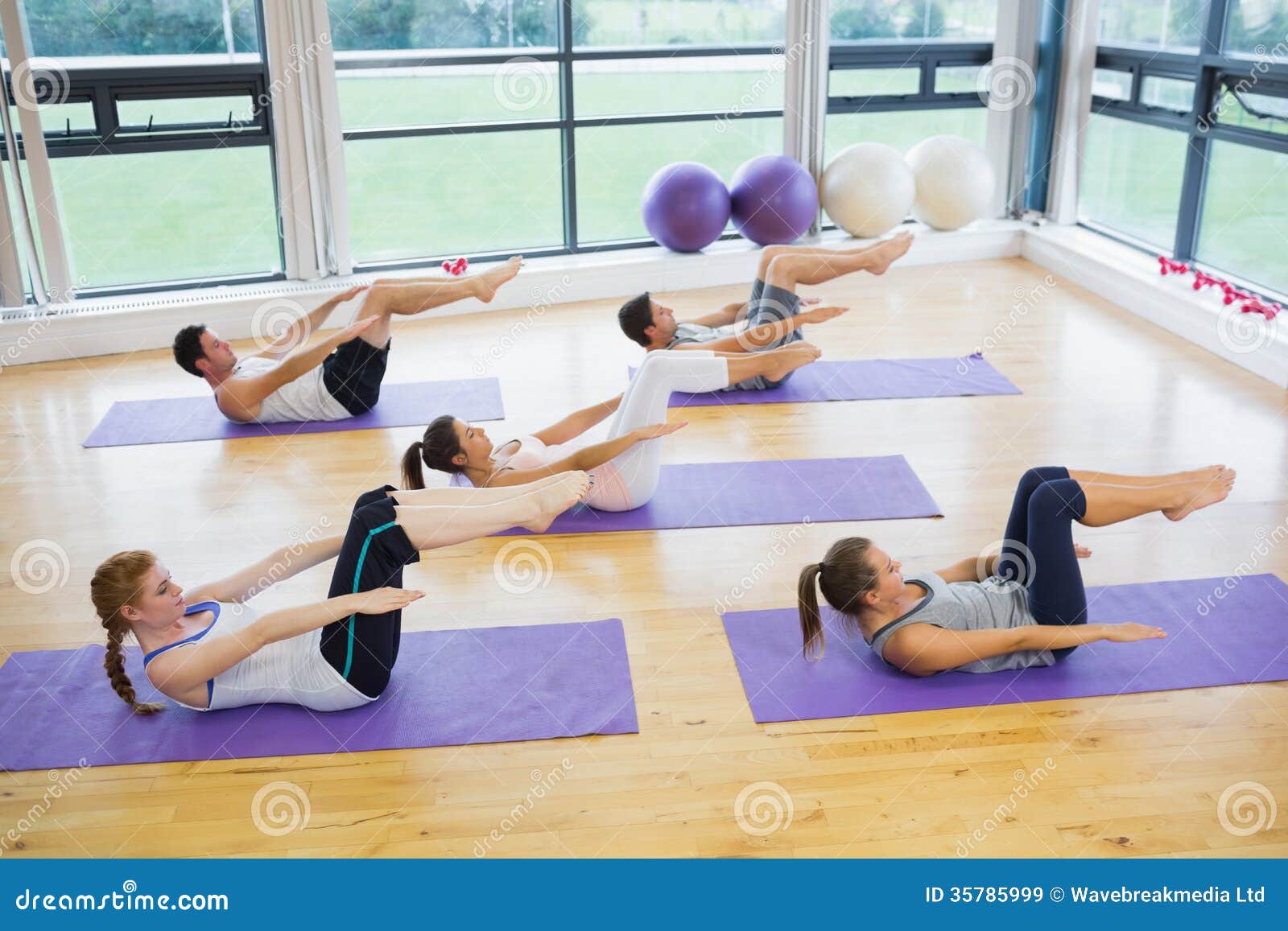 Class Stretching on Mats at Yoga Class Stock Image - Image of lifestyle ...