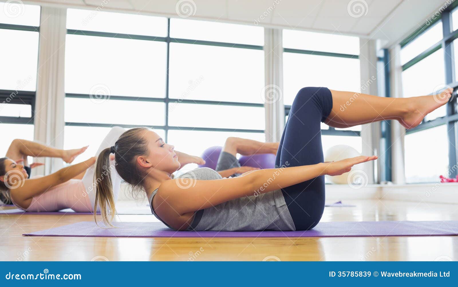 Class Stretching on Mats at Yoga Class in Fitness Studio Stock Image ...