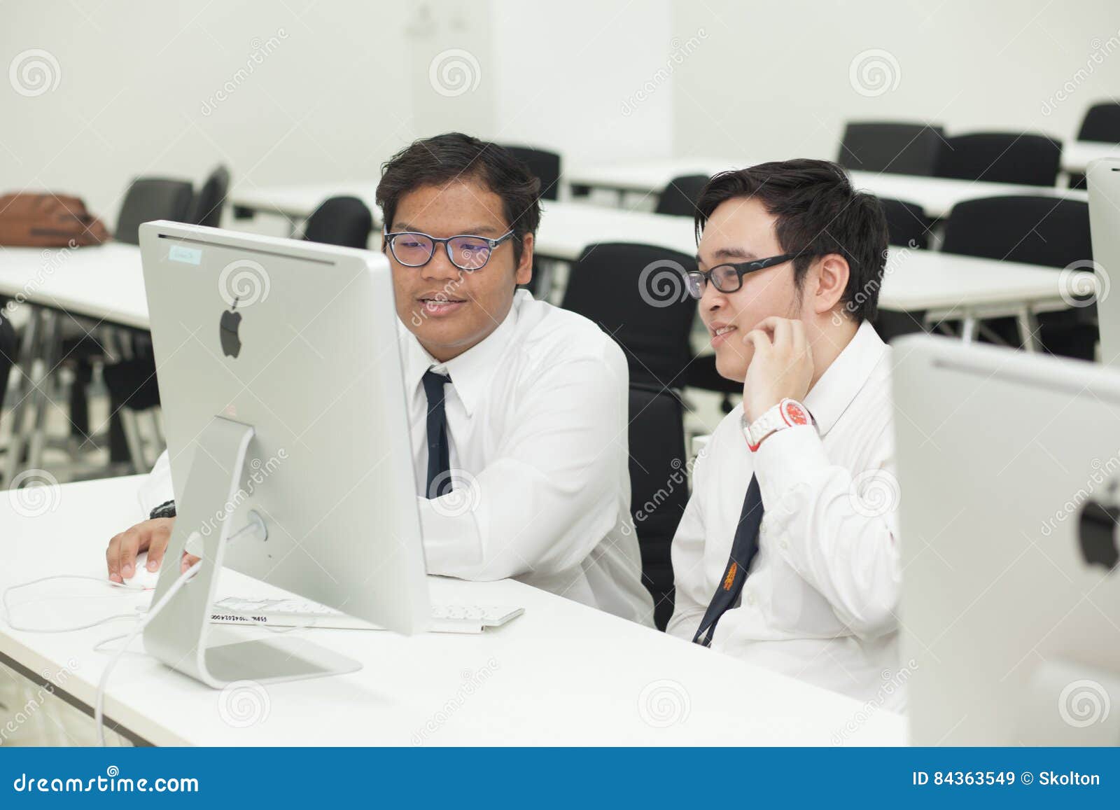 A Class of Students in Front of Their Screens Study Computer Science ...