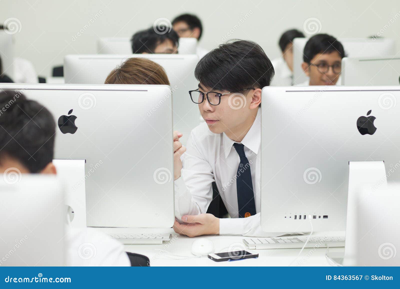 A Class of Students in Front of Their Screens Study Computer Science ...