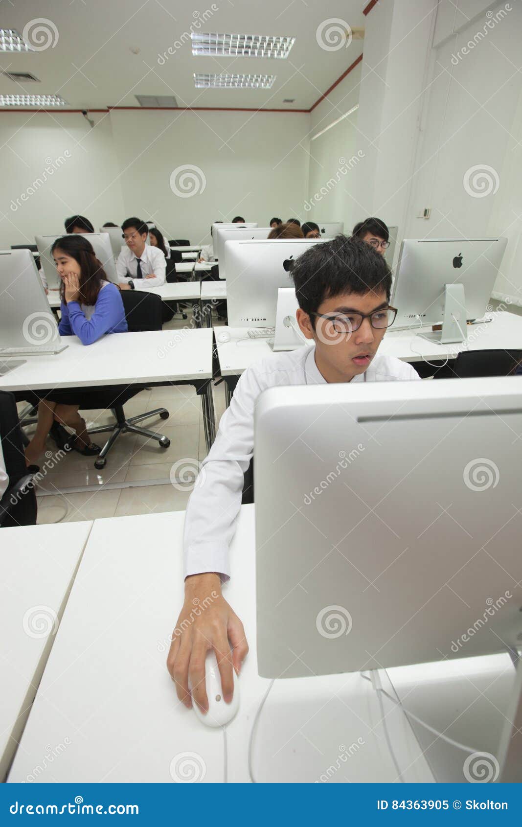 A Class of Students in Front of Their Screens Study Computer Science ...