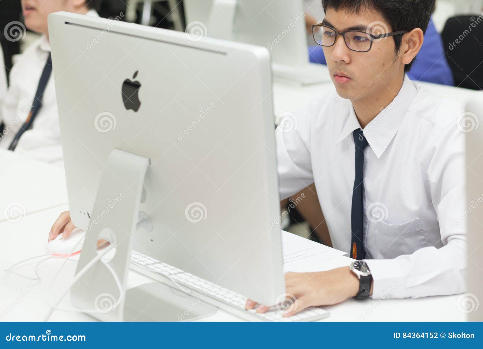 A Class of Students in Front of Their Screens Study Computer Science ...