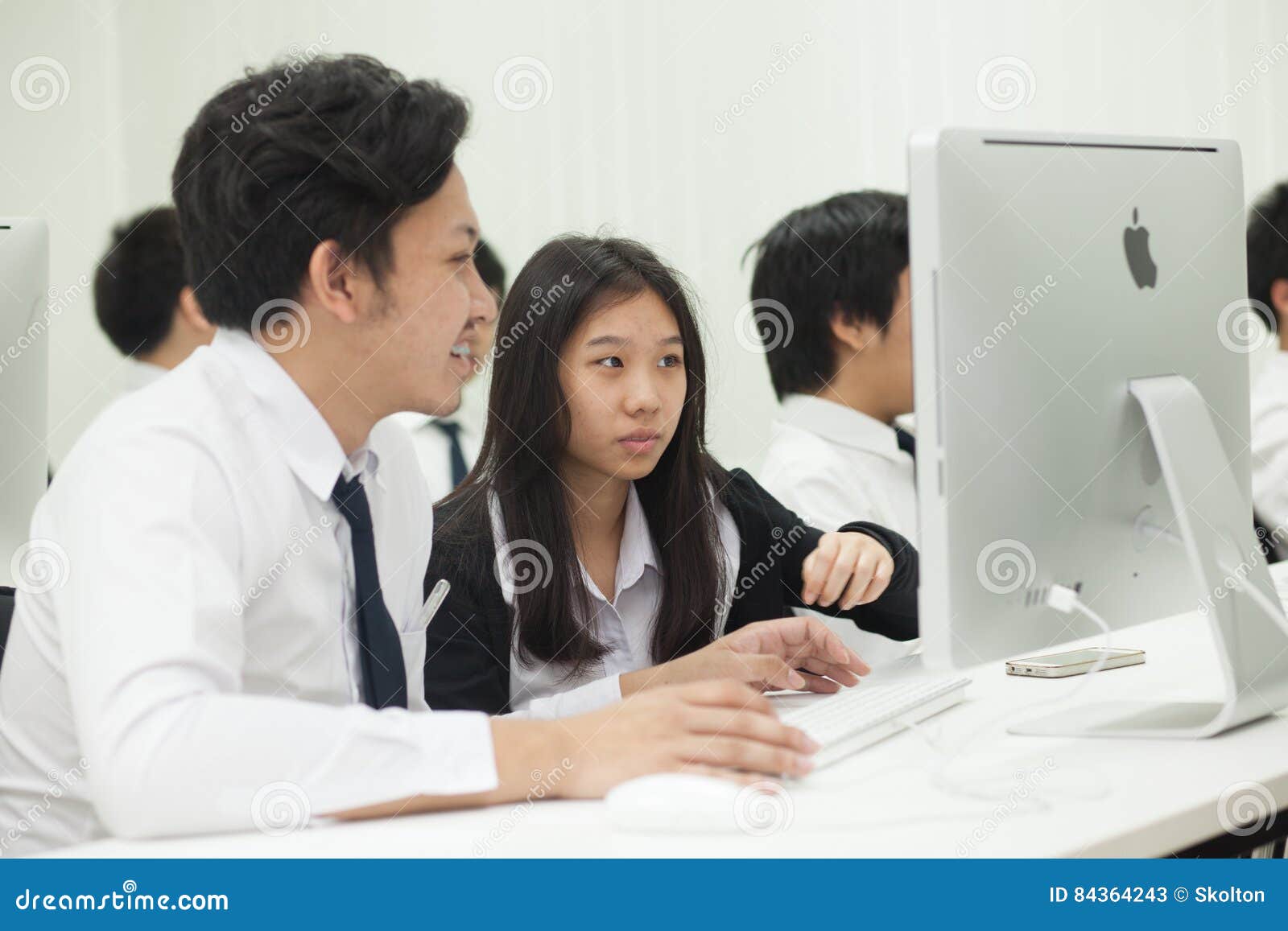 A Class of Students in Front of Their Screens Study Computer Science ...