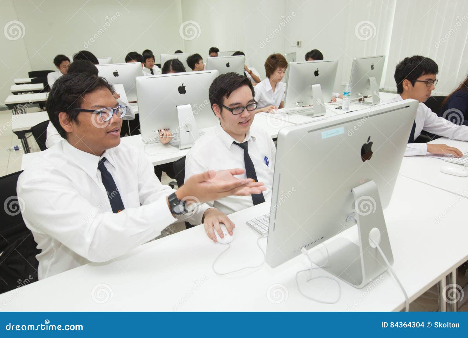 A Class of Students in Front of Their Screens Study Computer Science ...