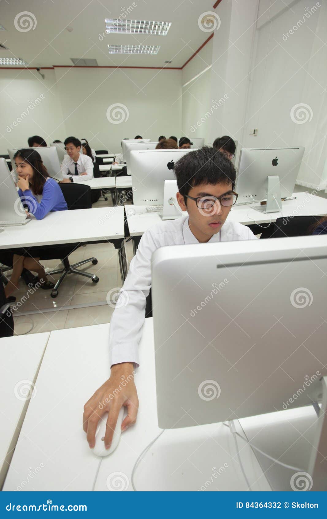 A Class of Students in Front of Their Screens Study Computer Science ...