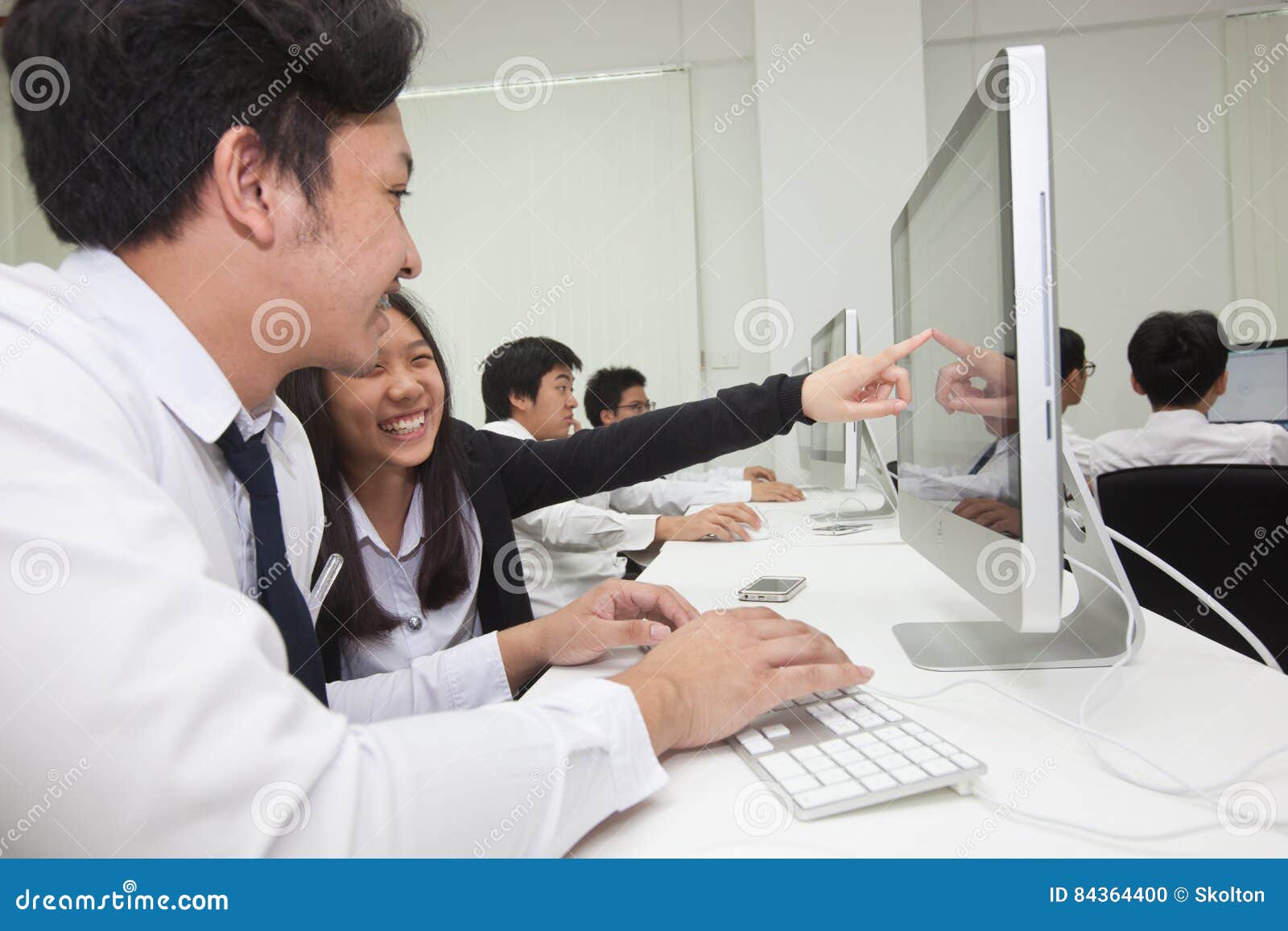 A Class of Students in Front of Their Screens Study Computer Science ...