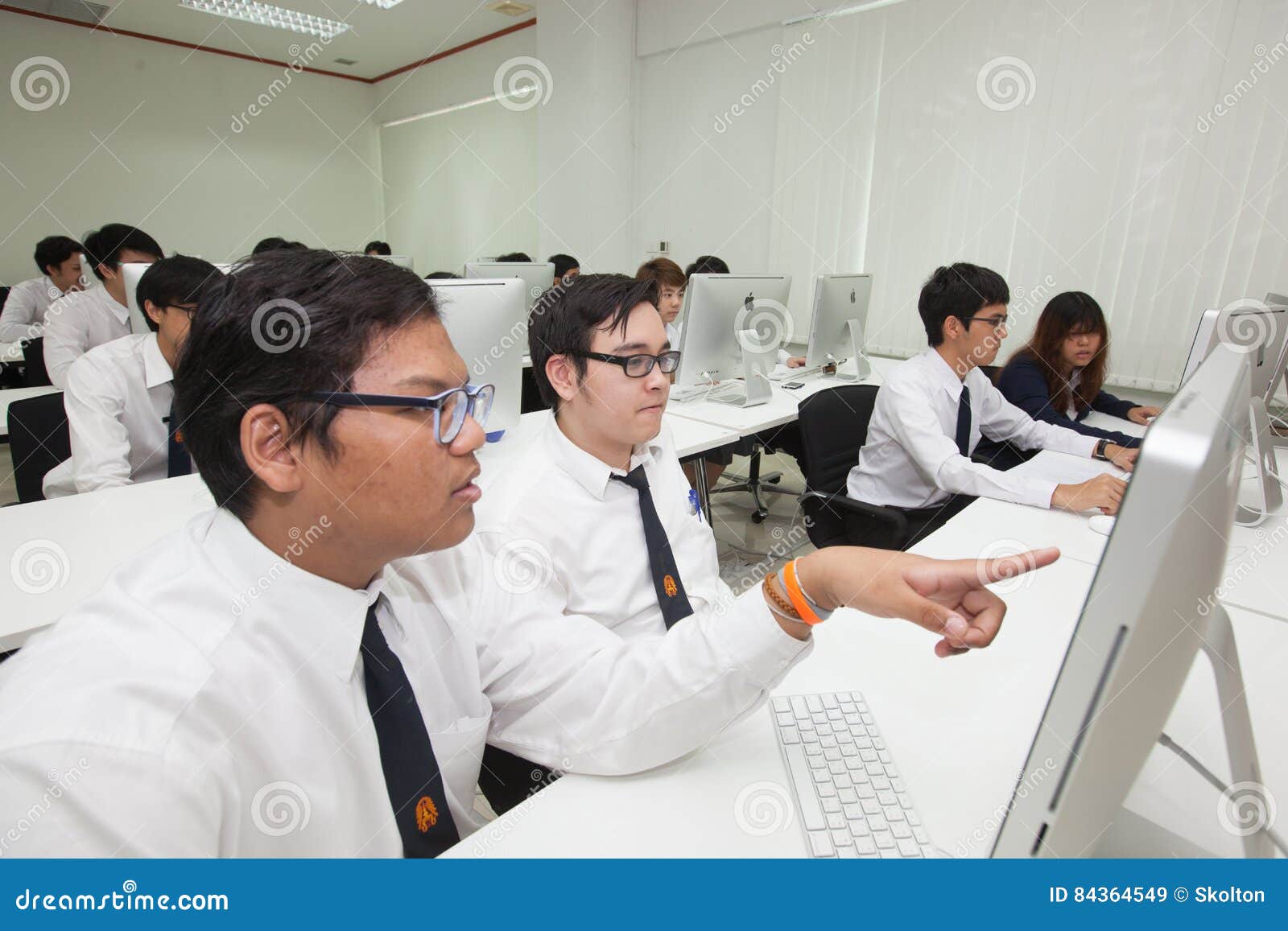 A Class of Students in Front of Their Screens Study Computer Science ...