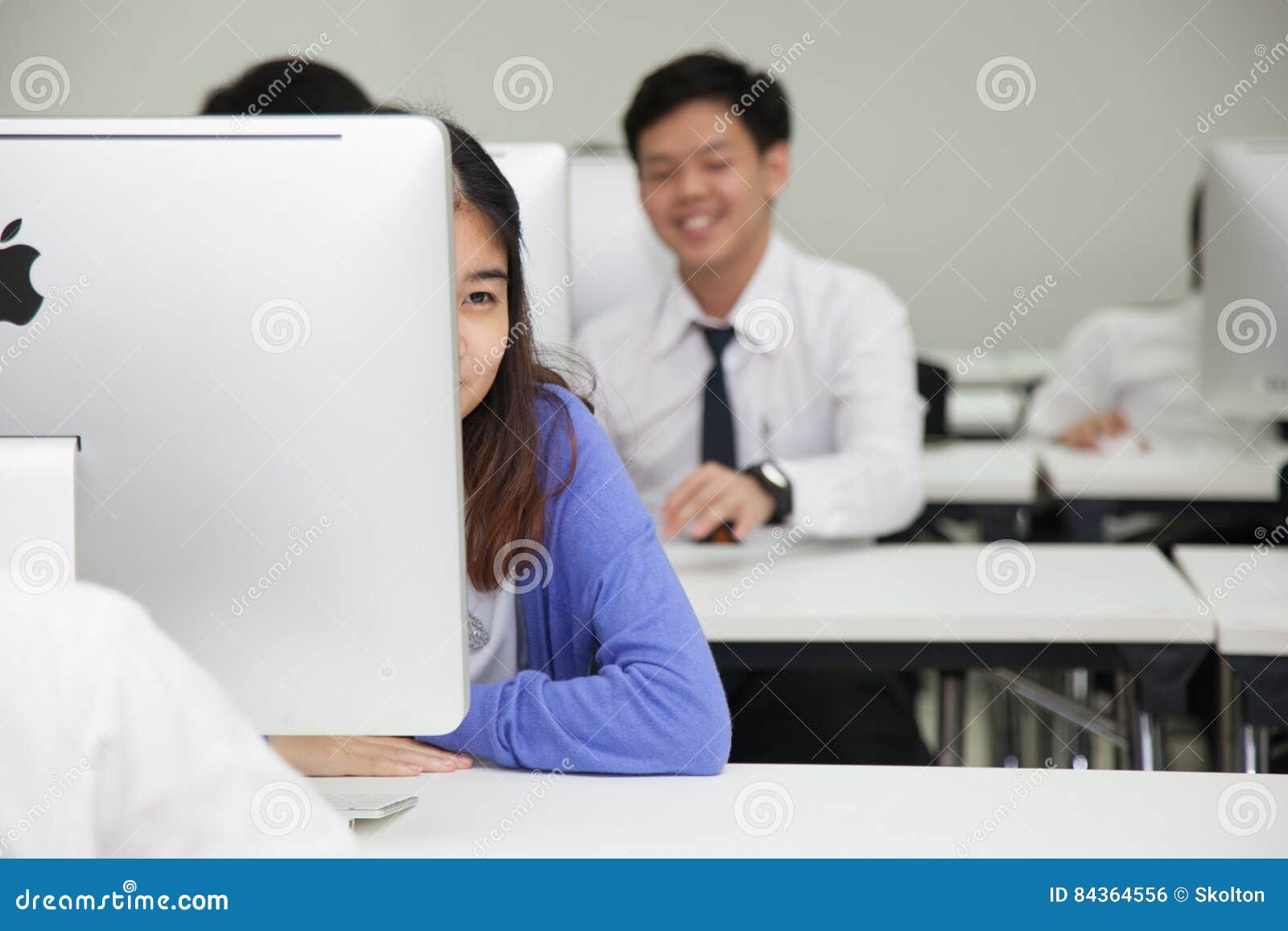A Class of Students in Front of Their Screens Study Computer Science ...