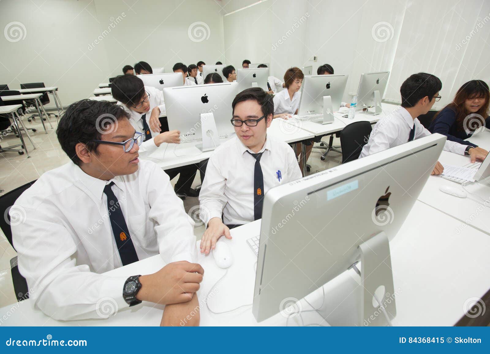 A Class of Students in Front of Their Screens Study Computer Science ...