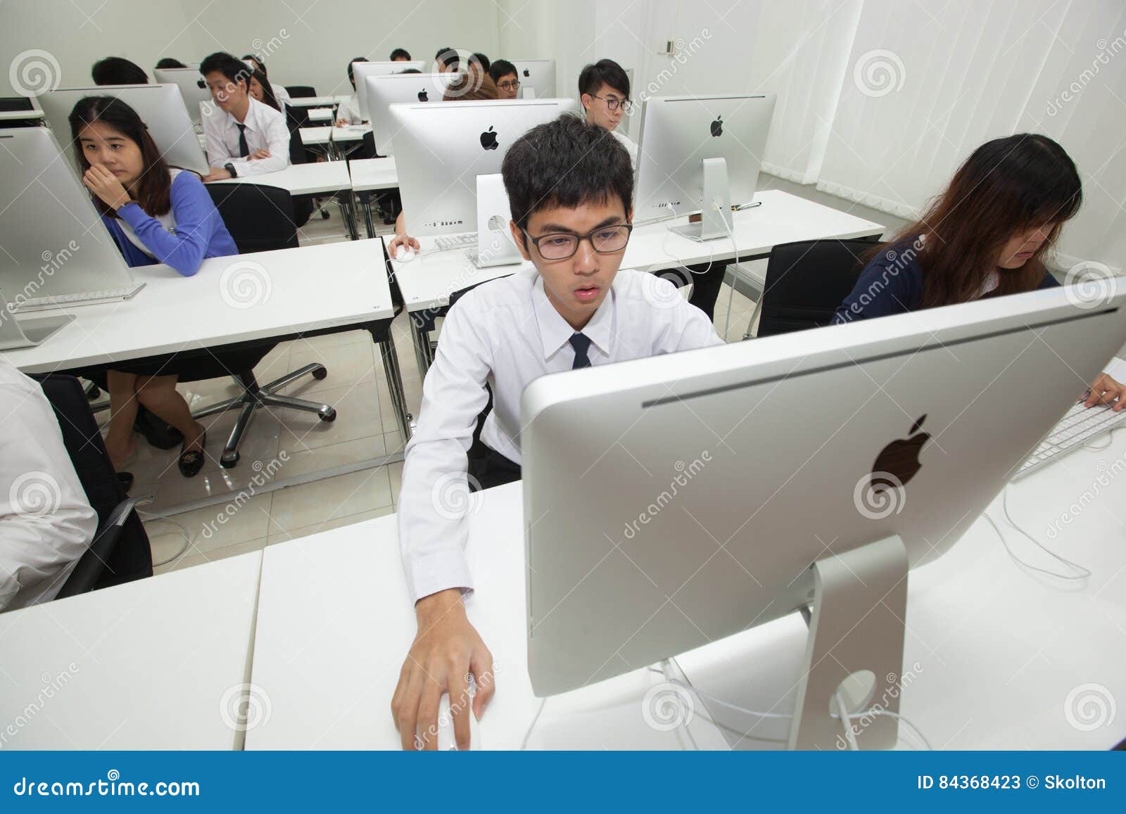 A Class of Students in Front of Their Screens Study Computer Science ...