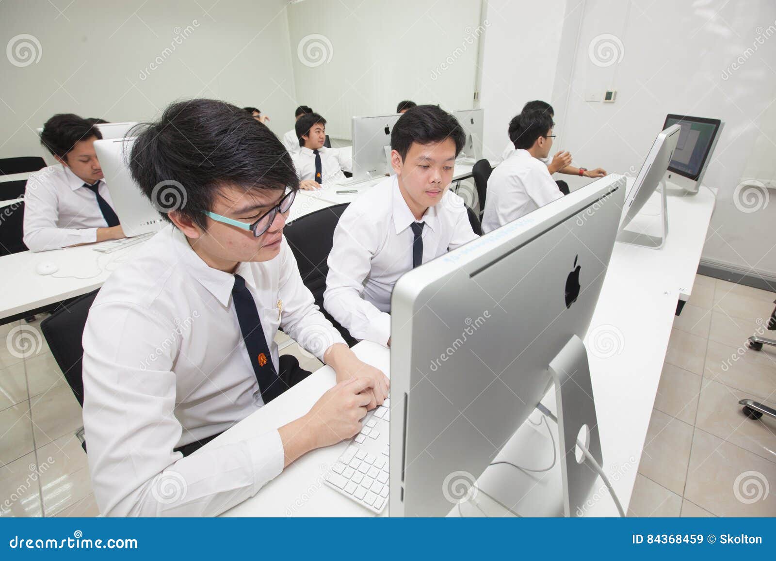 A Class of Students in Front of Their Screens Study Computer Science ...