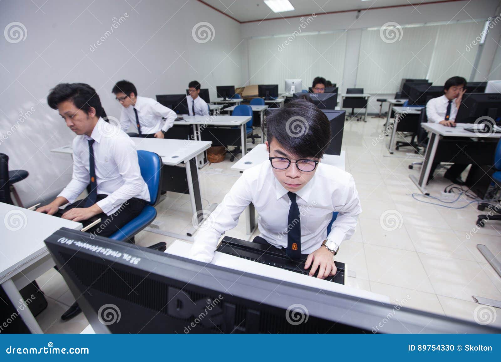 A Class of Students in Front of Their Screens Study Computer Science ...