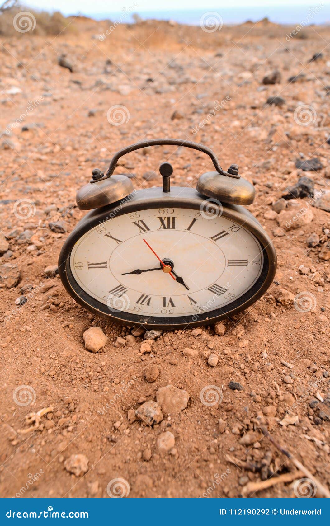 Classic Analog Clock in the Sand Stock Photo - Image of antique ...