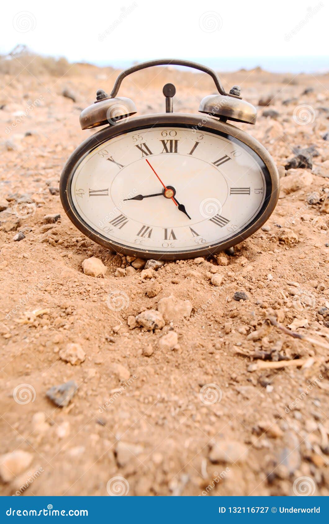 Classic Analog Clock in the Sand Stock Image - Image of imagery, sand ...