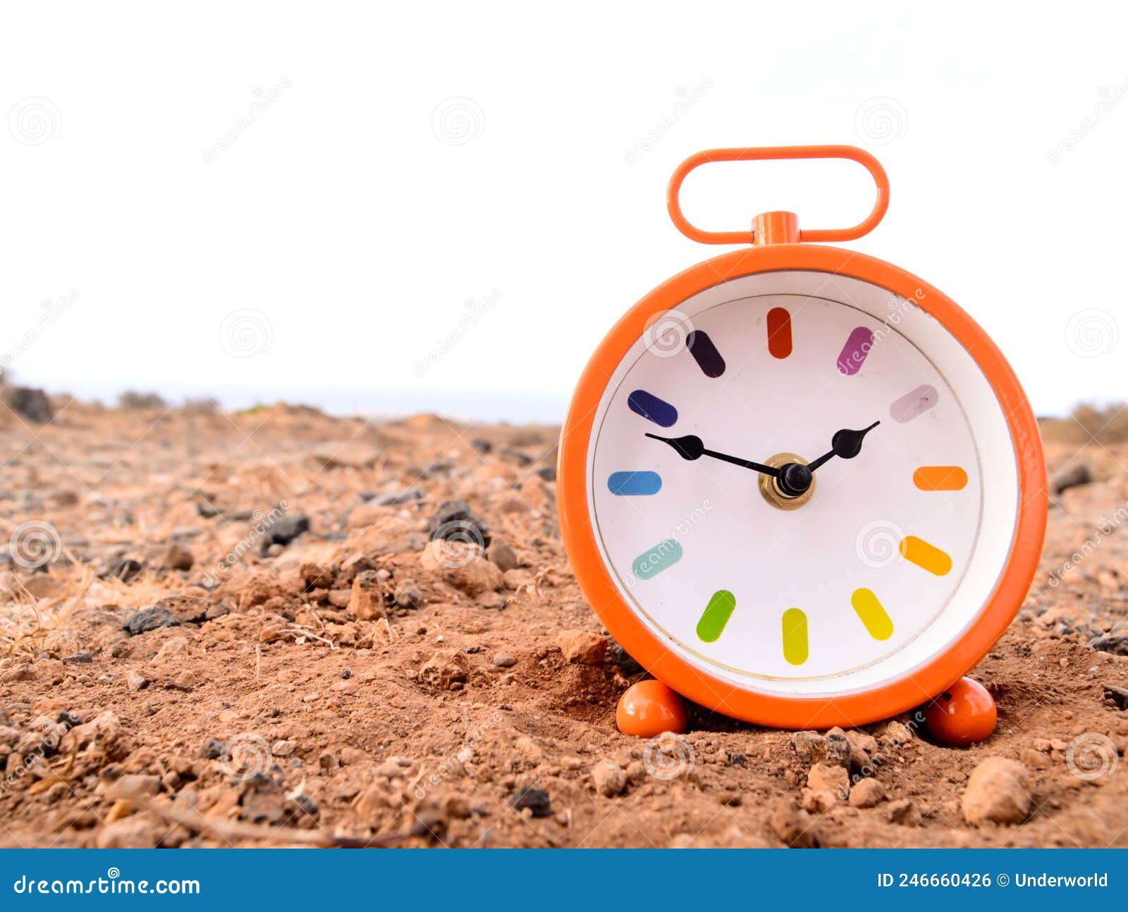 Classic Analog Clock in the Sand Stock Photo - Image of business ...
