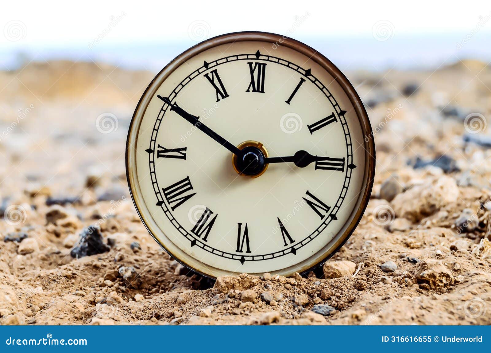 Classic Analog Clock in the Sand Stock Image - Image of hour, imagery ...