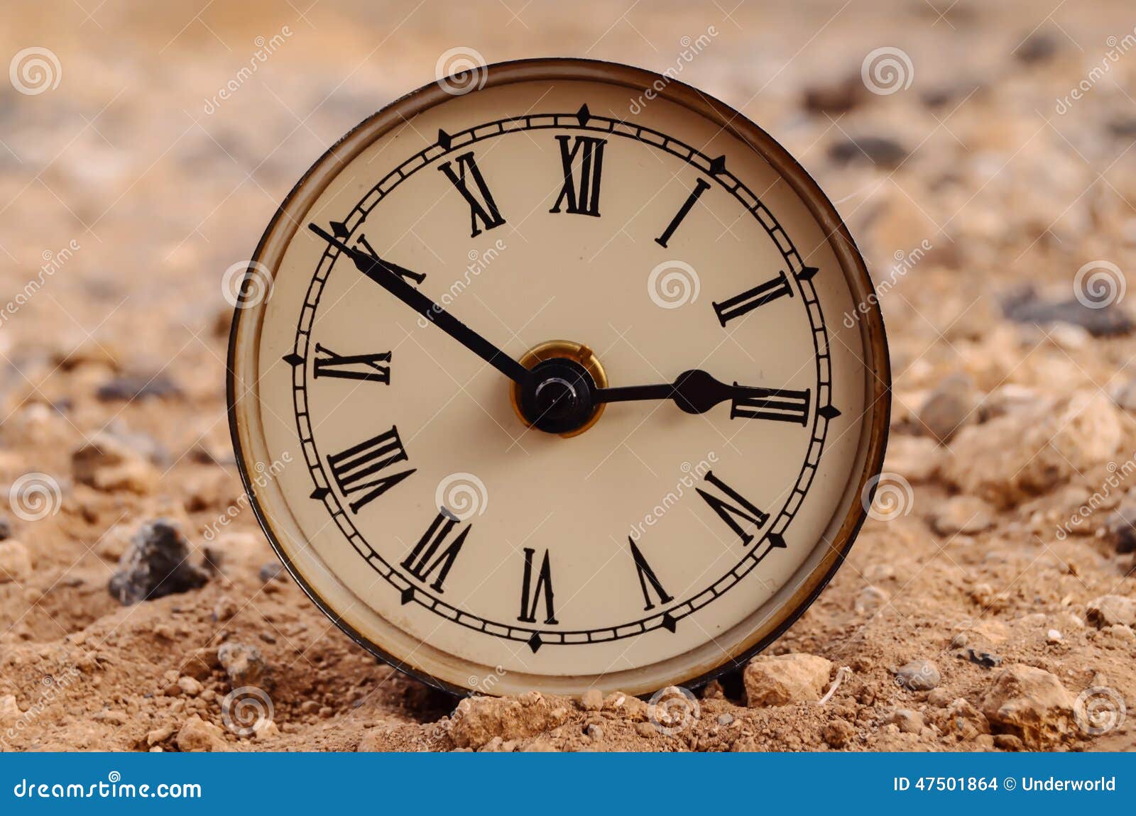 Classic Analog Clock in the Sand Stock Photo - Image of minute, clock ...
