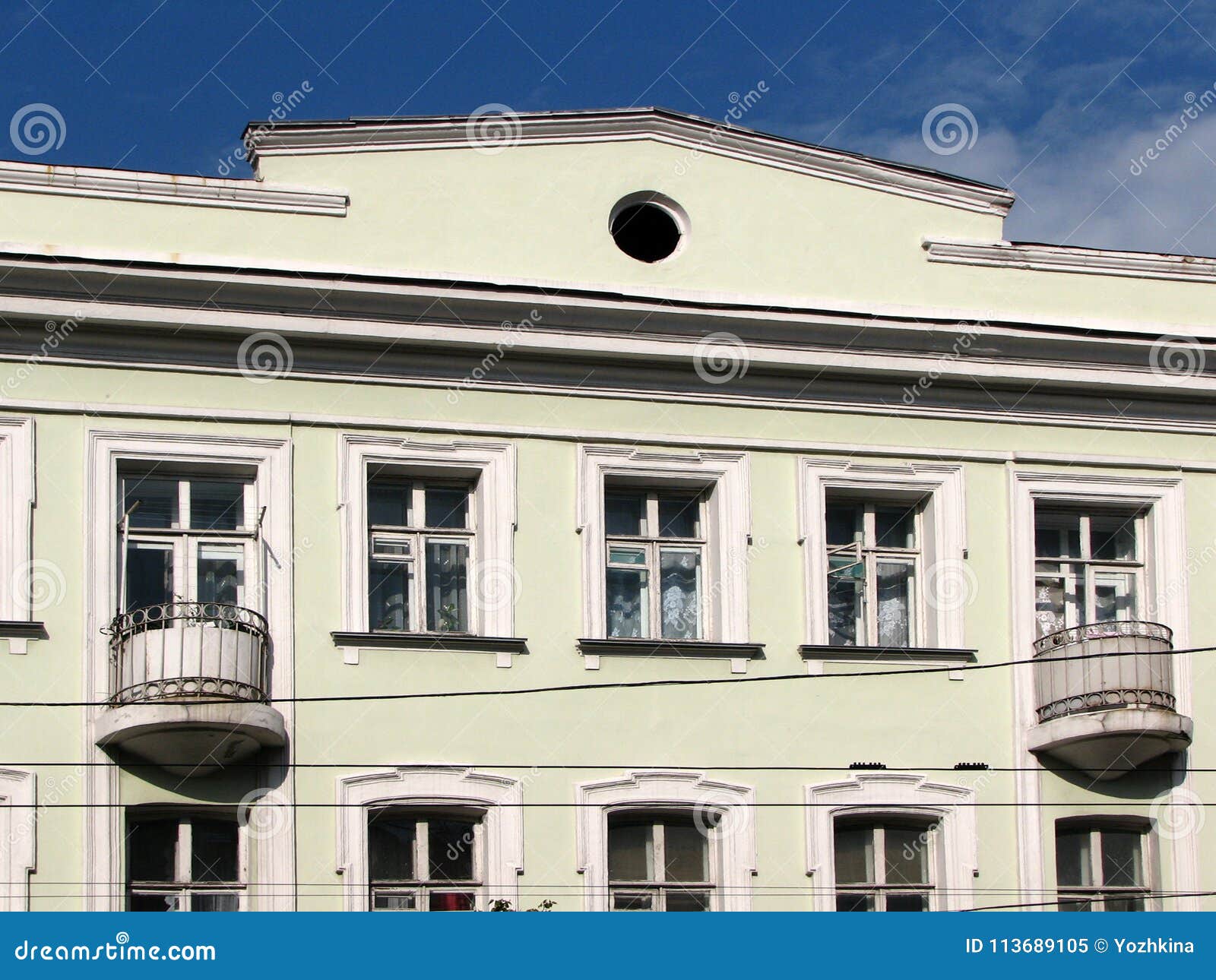 Classic Building White Facade with Windows and Circle Balconies Stock ...