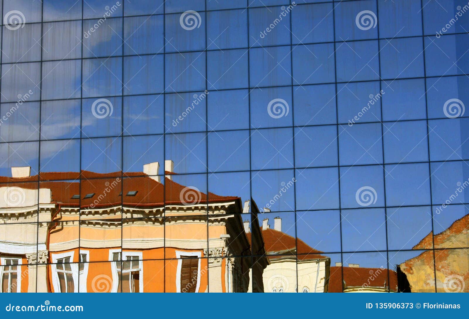 Classic Architecture Building Reflected Distorted in a Modern Building ...