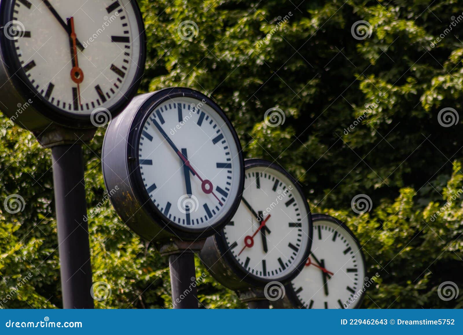 Classic Black and White Analog Clocks with Synchronized Time Show ...