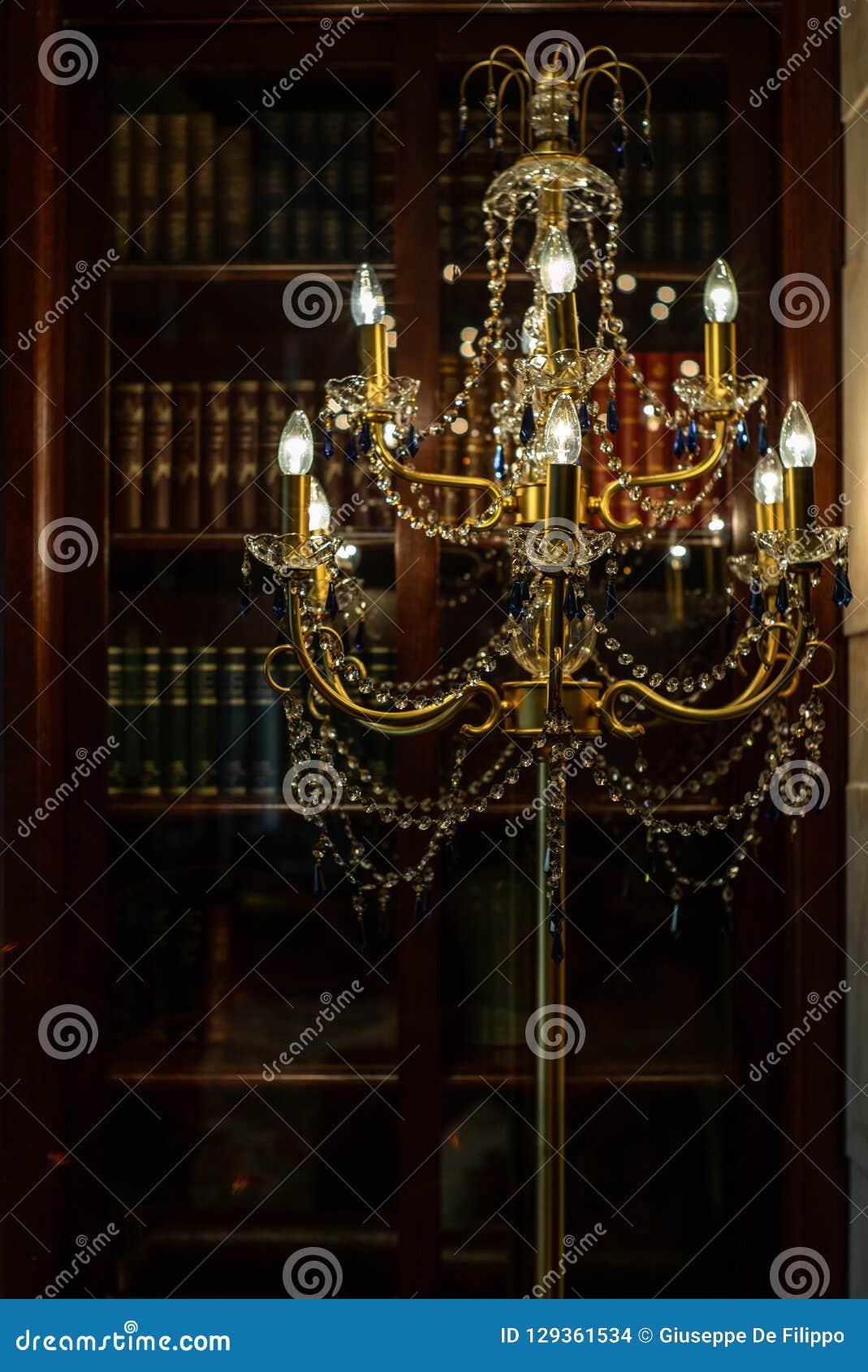 A Classic British Design Crystal Chandelier in a Library - 2 Stock ...