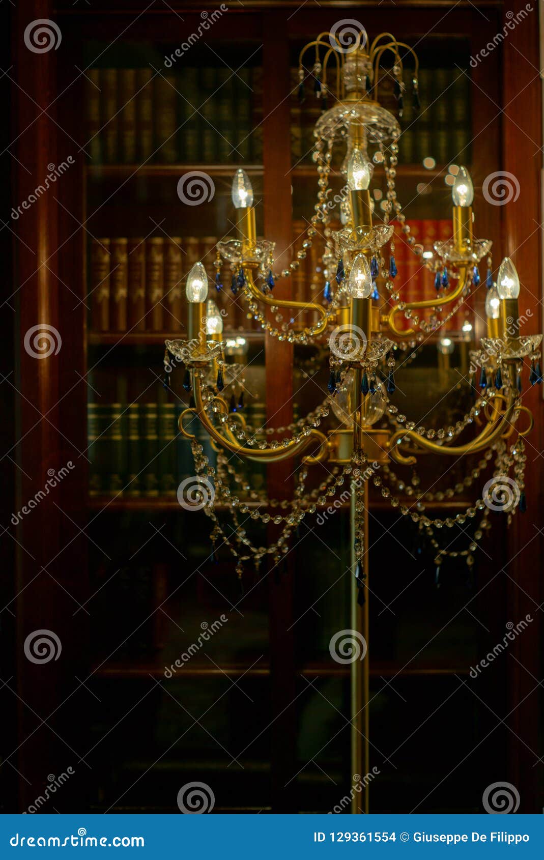 A Classic British Design Crystal Chandelier in a Library - 1 Stock ...