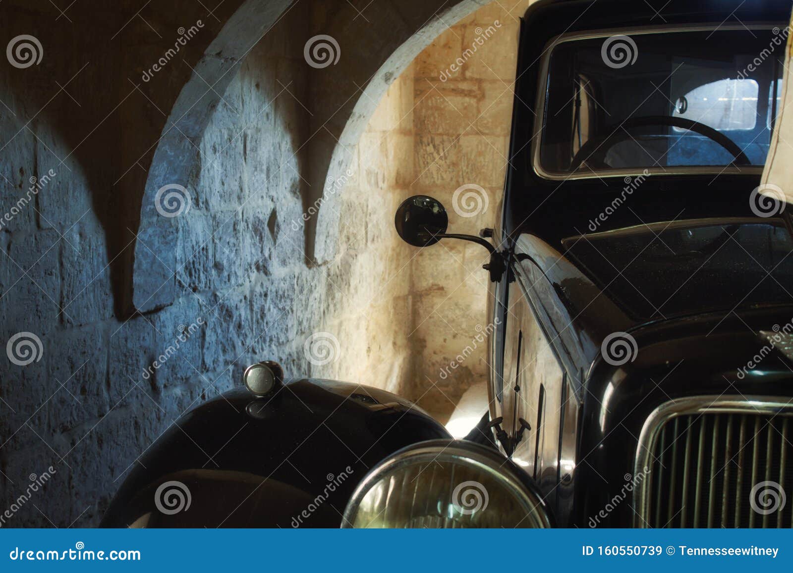 Classic Car Stored in a Basement with Stone Walls Stock Image - Image ...