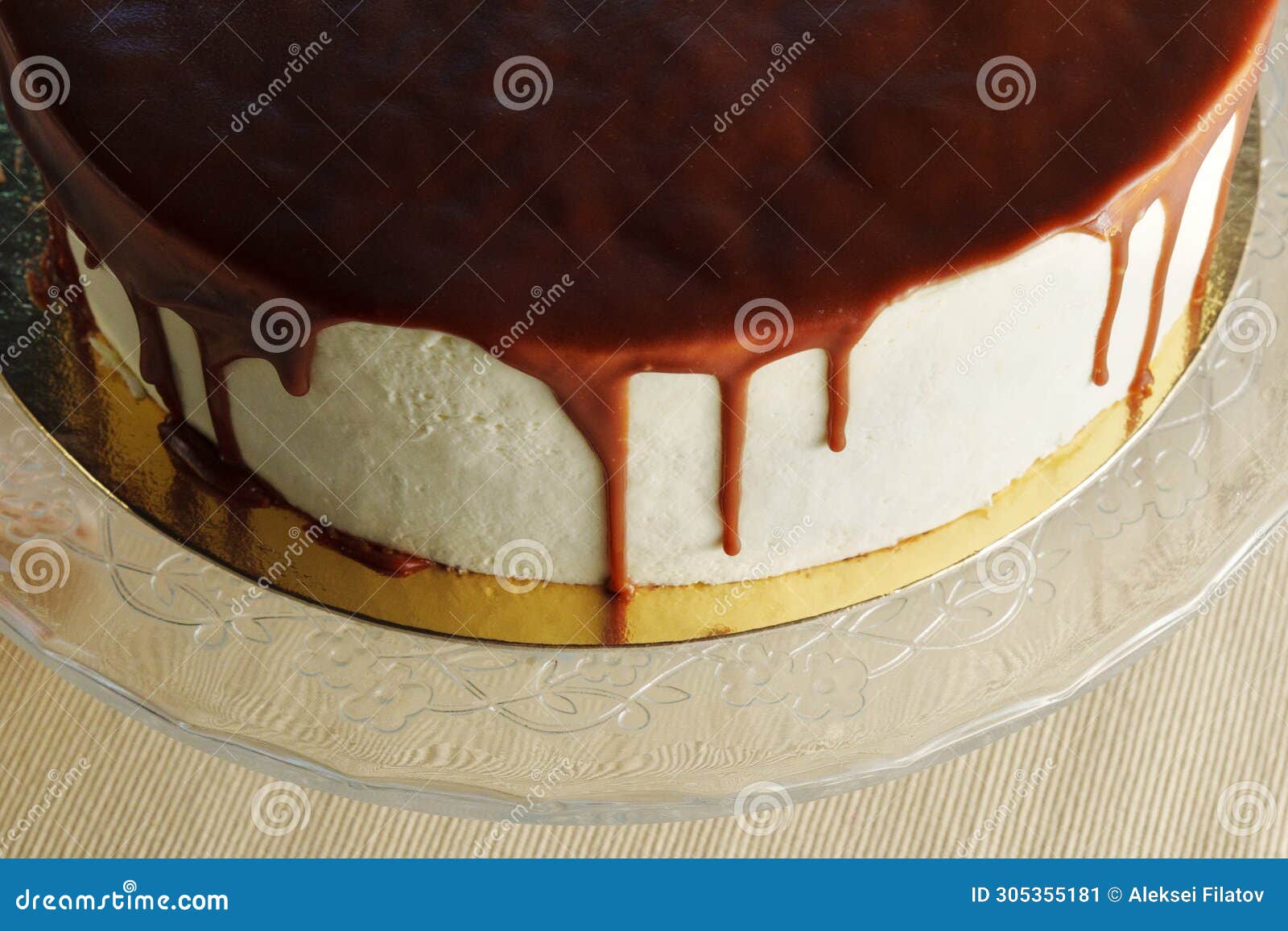 Classic Cheesecake Topped with a Smooth Chocolate Ganache Drips ...