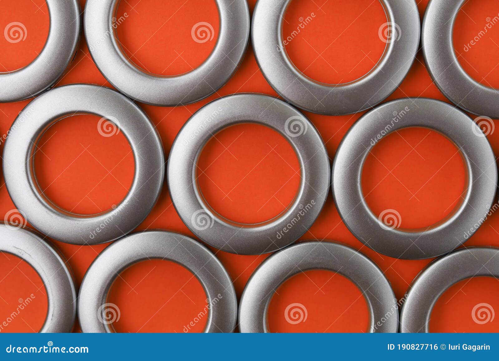 Classic Chrome Eyelets for Curtains on an Orange Background Stock Photo ...