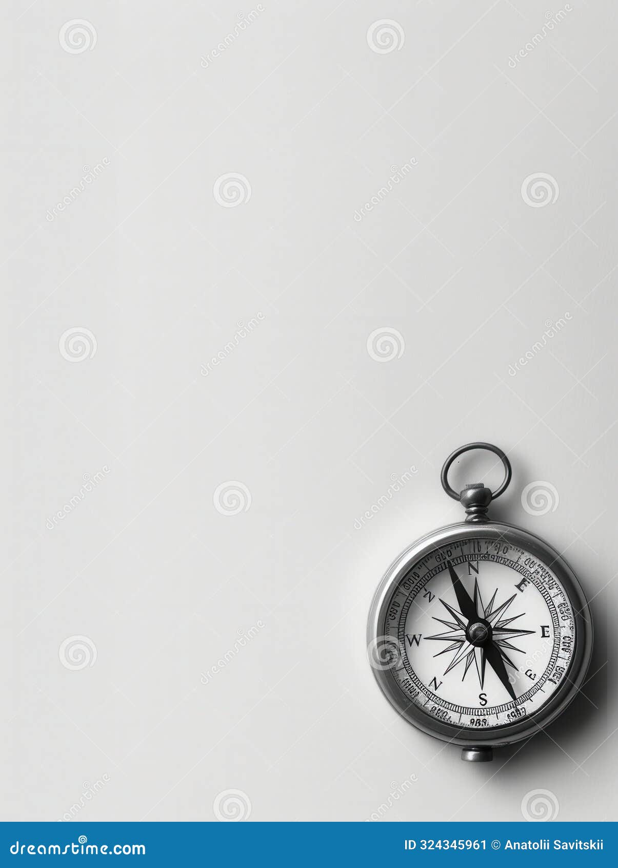 A Classic Compass with a Black Needle Pointing North on a White ...