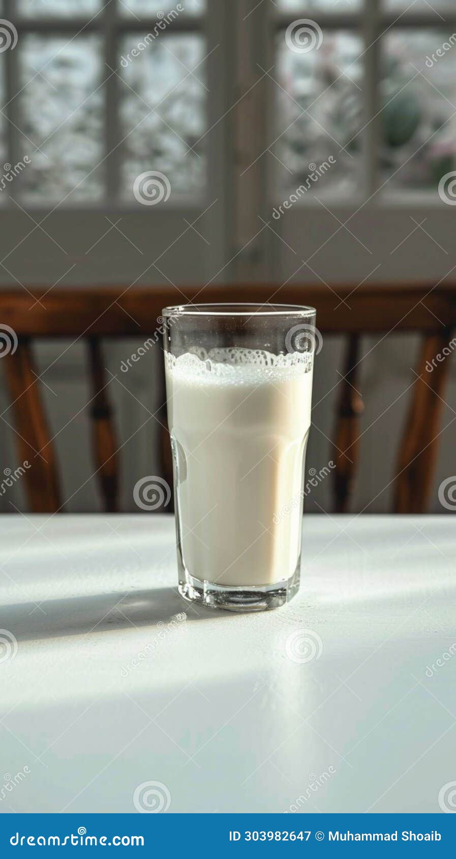 Classic Composition Glass of Milk, Side View, on White Table Stock ...