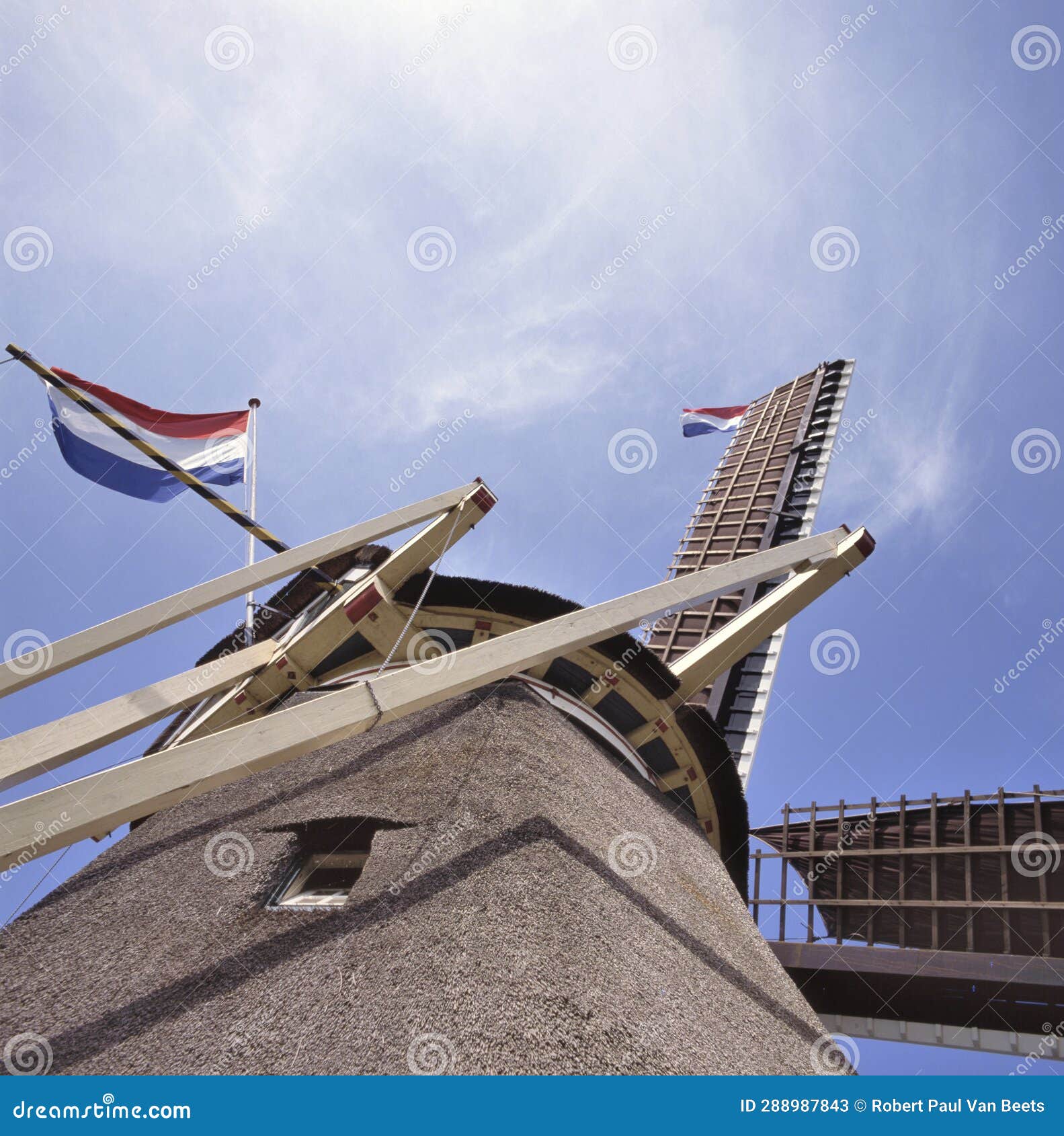 Classic Dutch Windmill with Two Dutch National Flags Stock Image ...