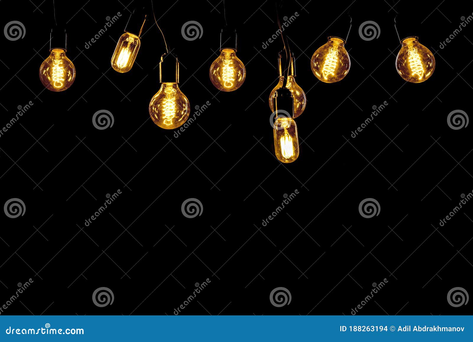Retro Style Bulbs. Vintage Glowing Light Bulbs on a Black Background ...