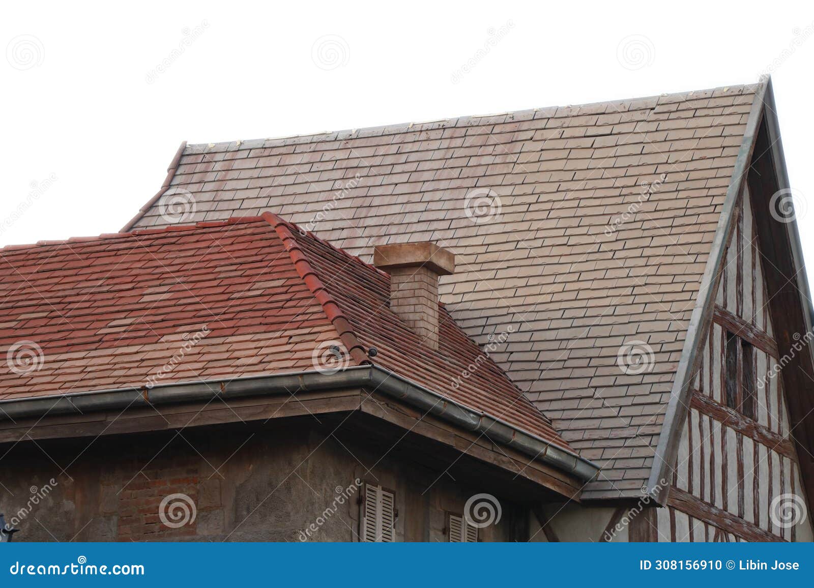 Classic European Roof and Brick Work with Chimney Stock Photo - Image ...
