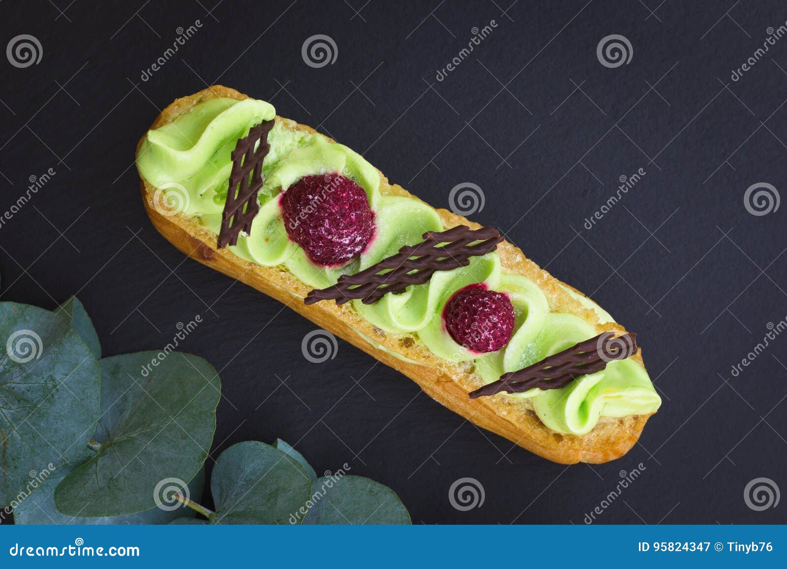 Classic French Pistachio Eclair Decor by Raspberry and Chocolate Stock ...