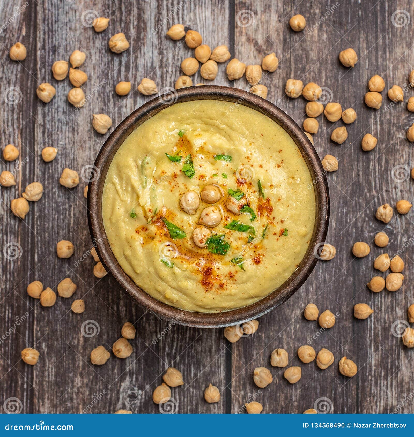 Classic Hummus in Bowls on Wooden Table. Top View Stock Photo - Image ...
