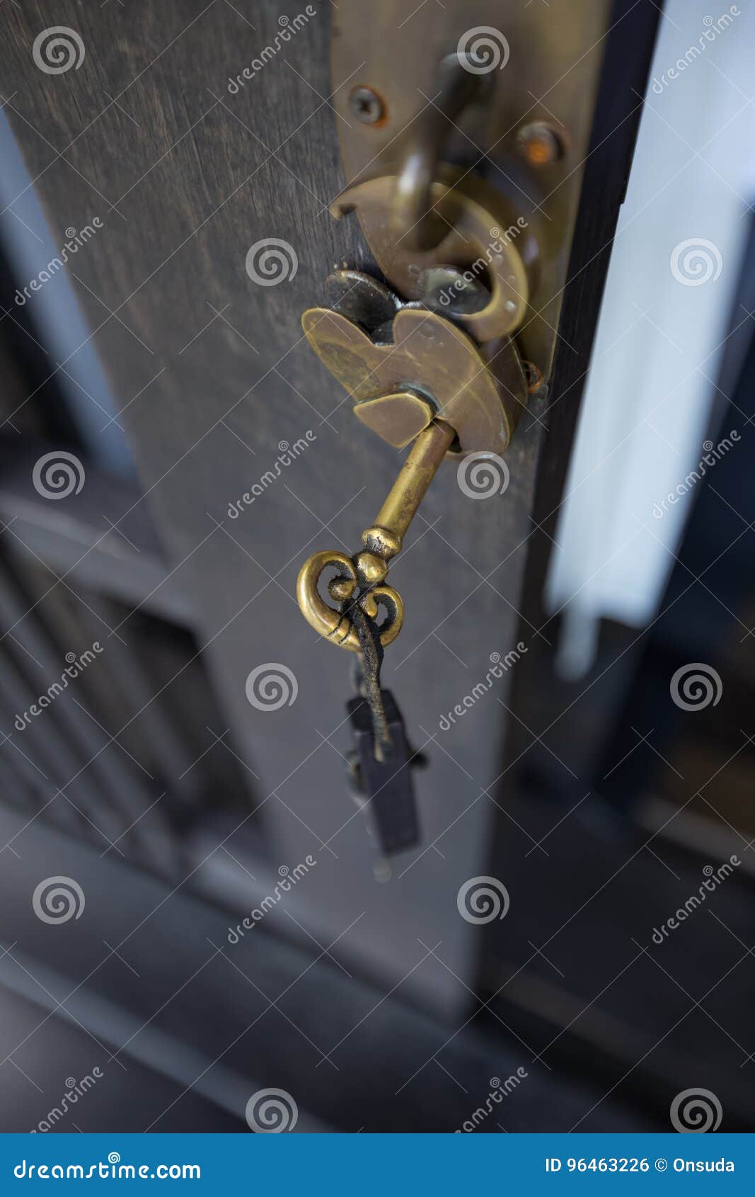 Classic key on wood door stock photo. Image of lock, safety - 96463226